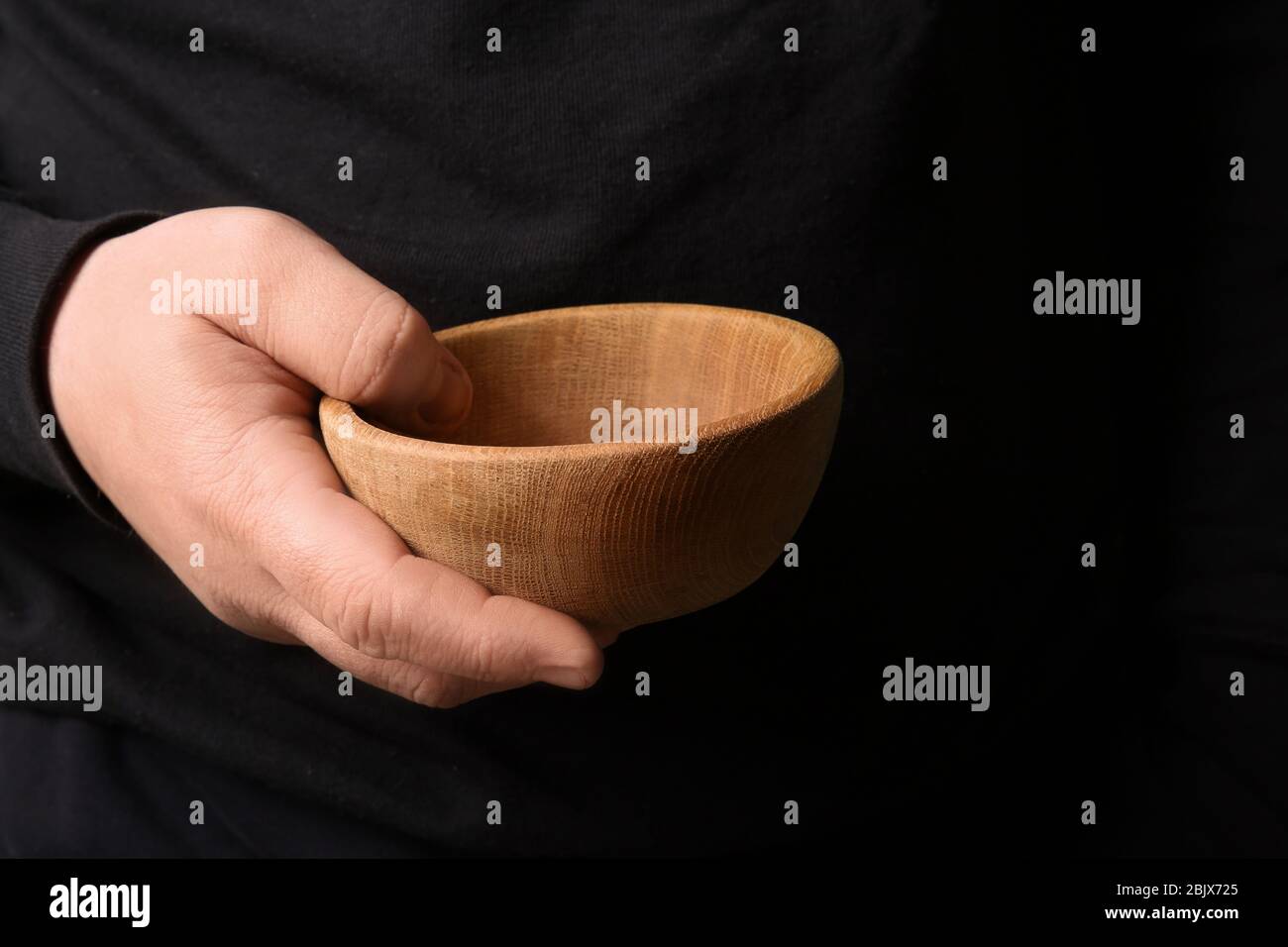 Poor man with bowl, closeup Stock Photo - Alamy