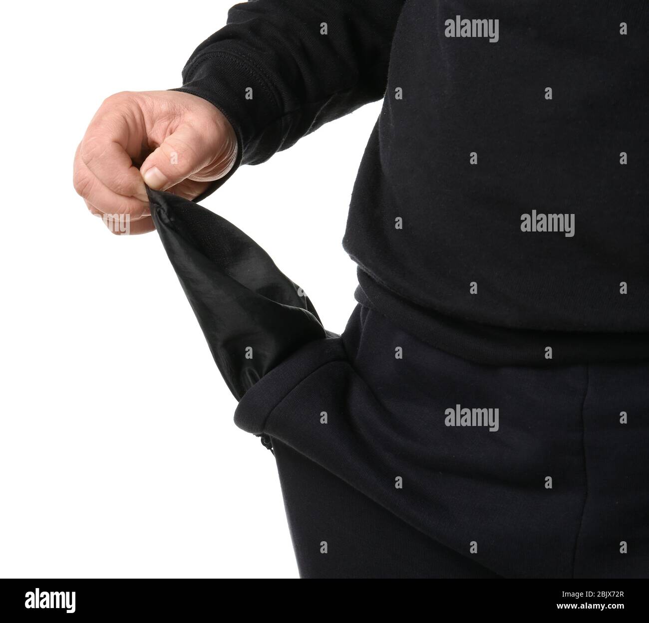 Poor man showing empty pocket on white background Stock Photo - Alamy