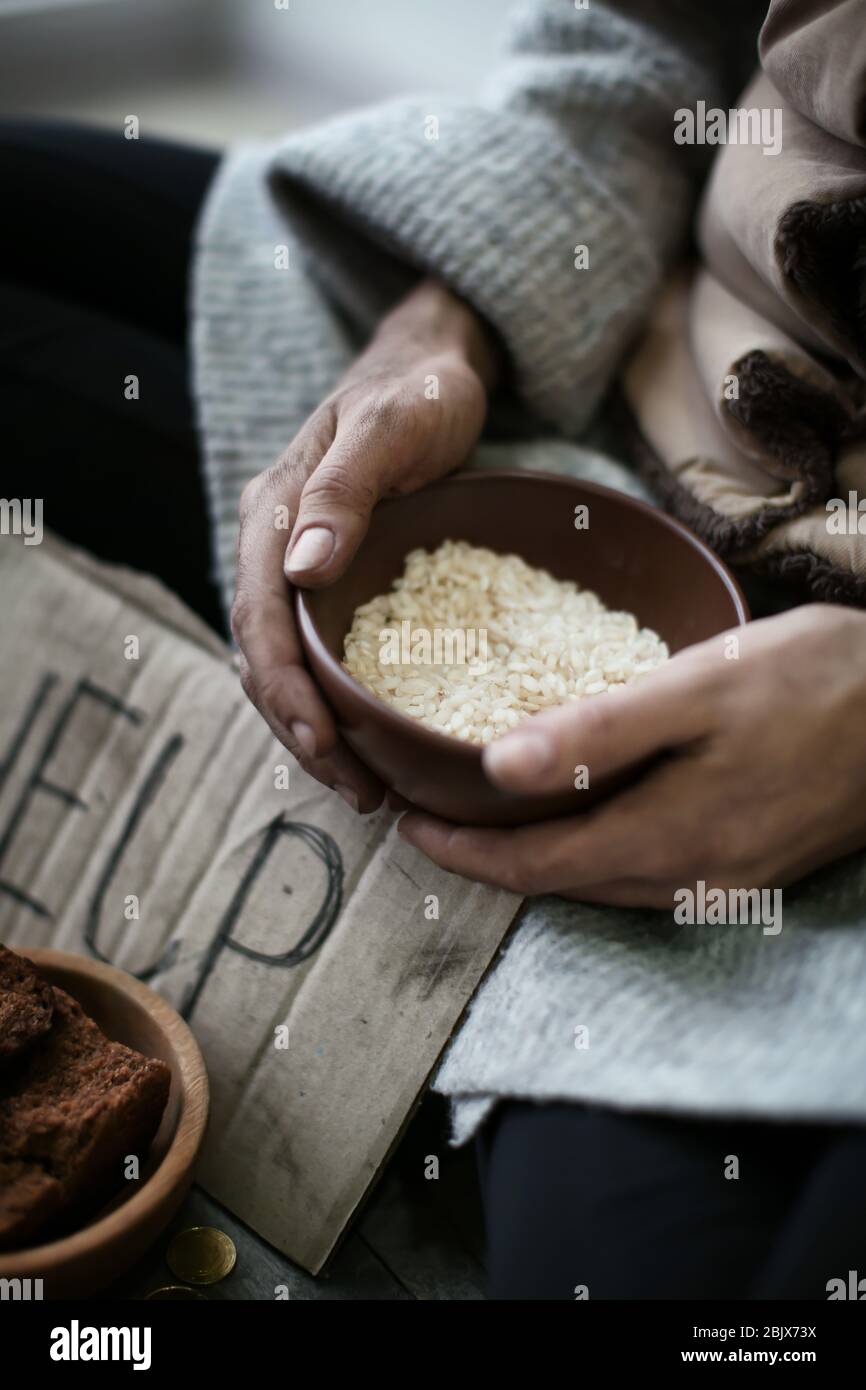 Holding bowl of rice hi-res stock photography and images - Alamy
