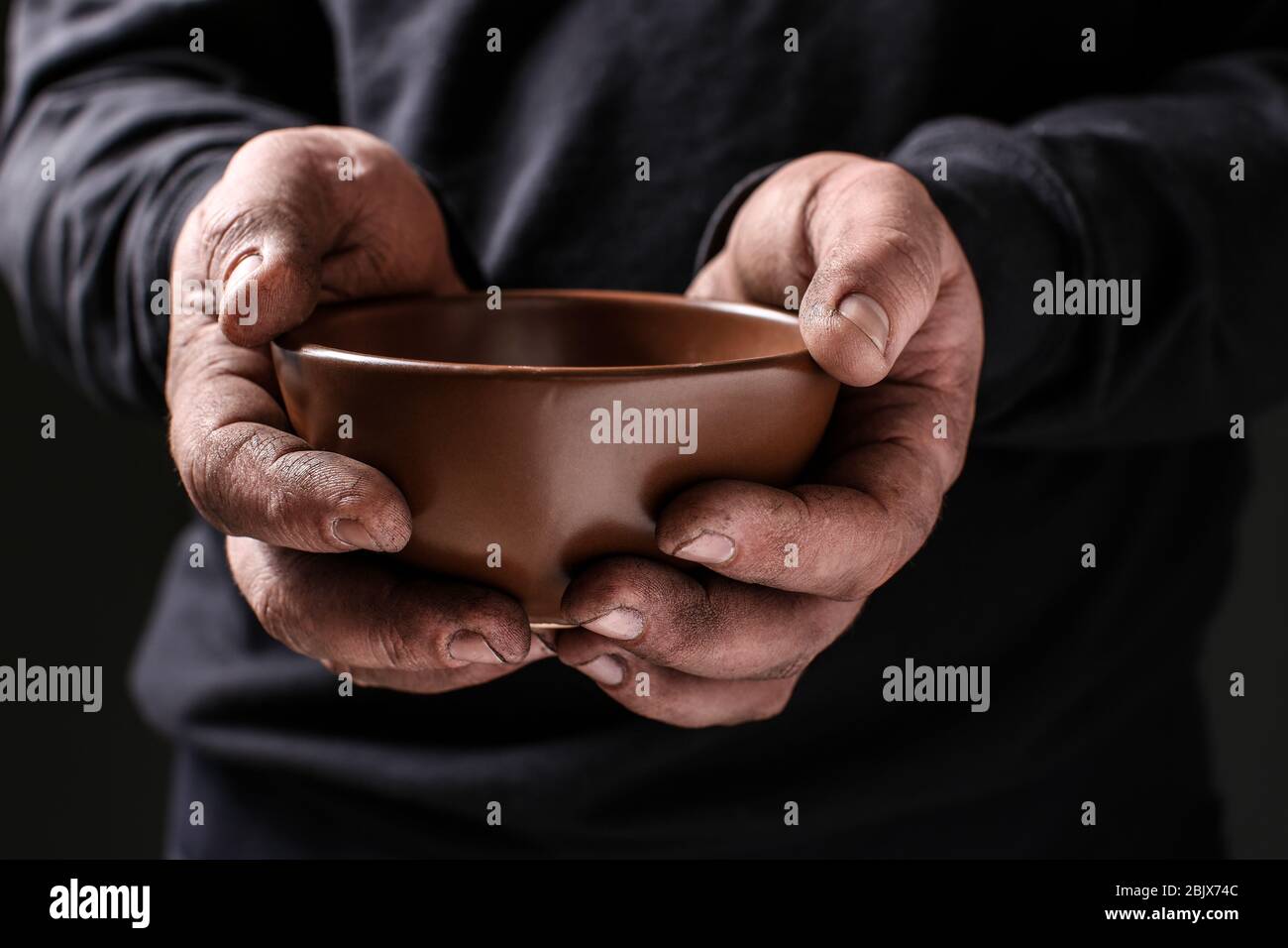 Begging bowl hi-res stock photography and images - Alamy