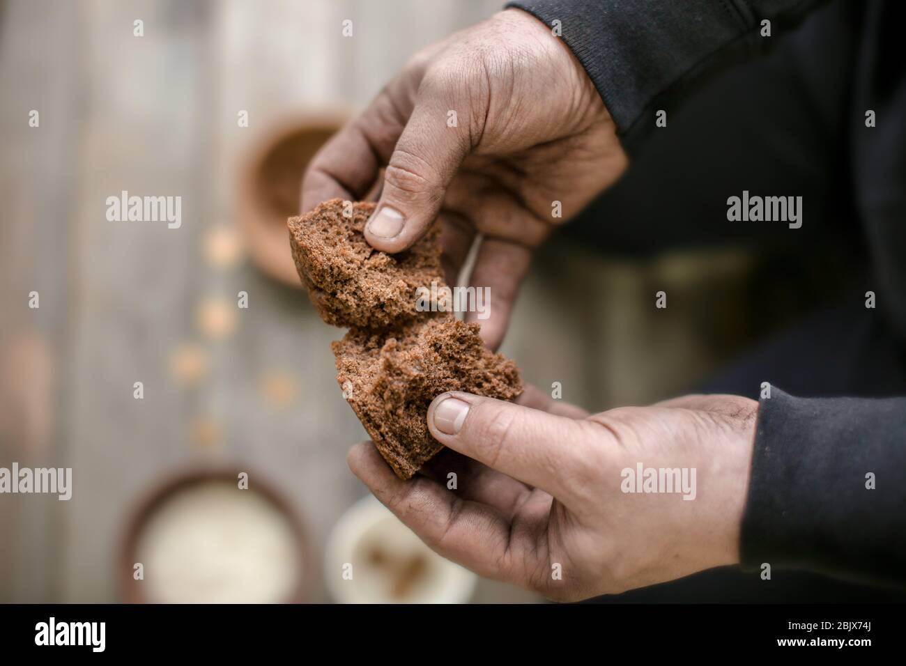Poor man holding hi-res stock photography and images - Alamy
