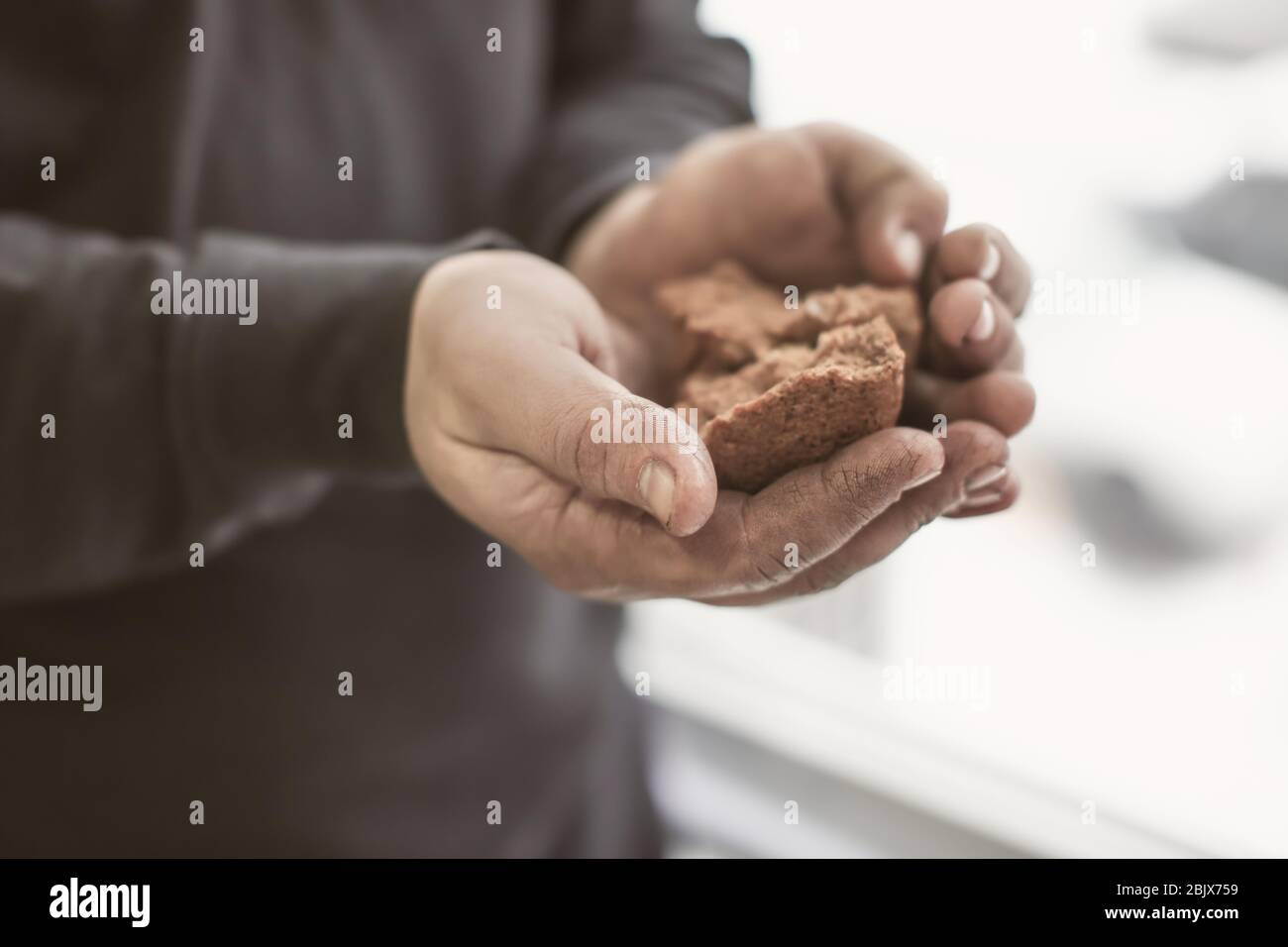Poor man holding hi-res stock photography and images - Alamy
