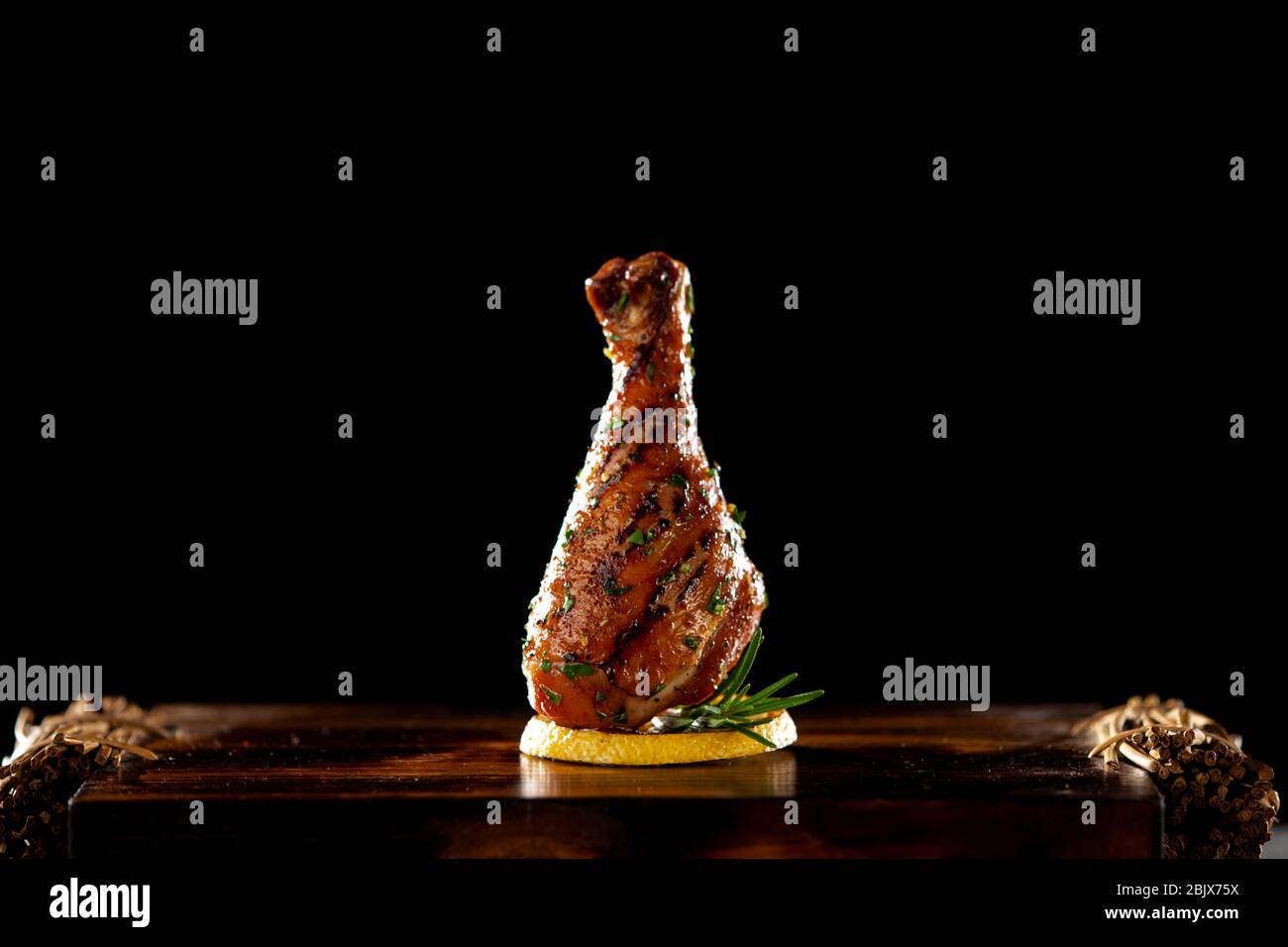 Grilled Chicken Leg on a decorative presentation Stock Photo - Alamy
