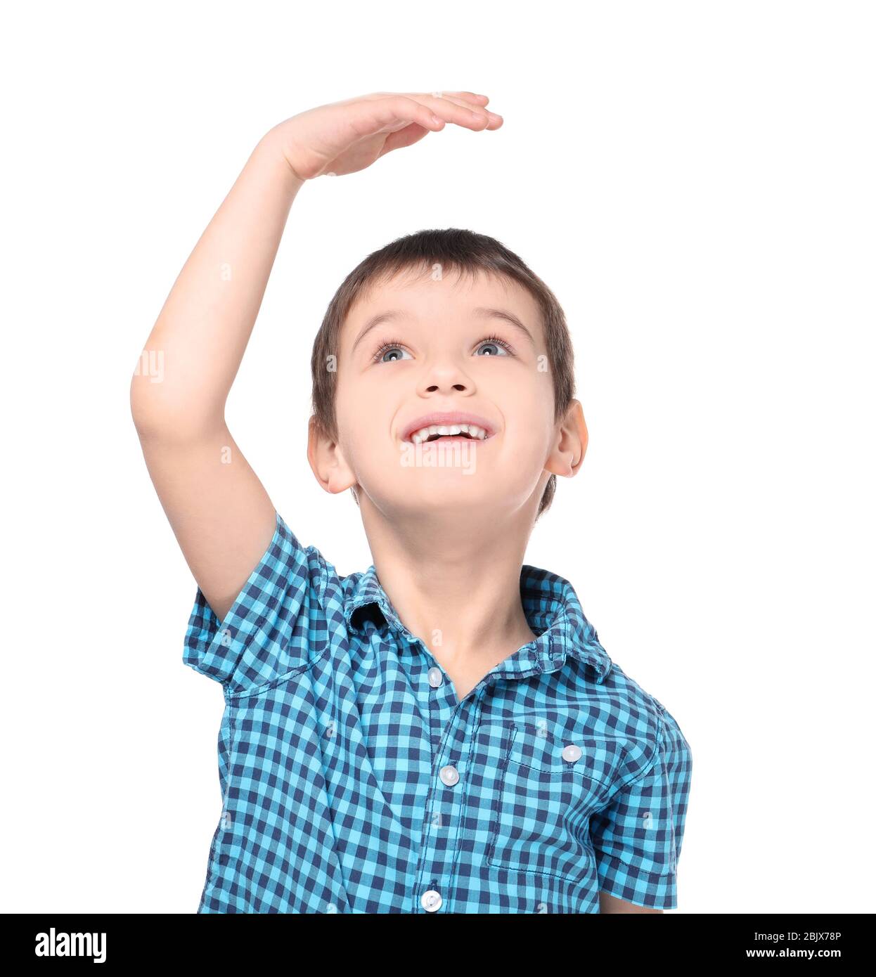 Little boy measuring height on white background Stock Photo - Alamy