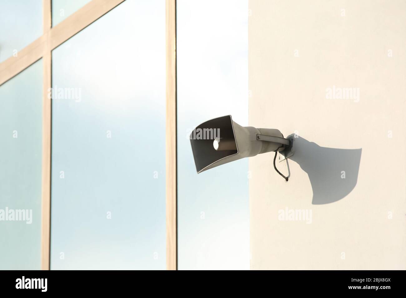 Megaphone on wall outdoors Stock Photo - Alamy