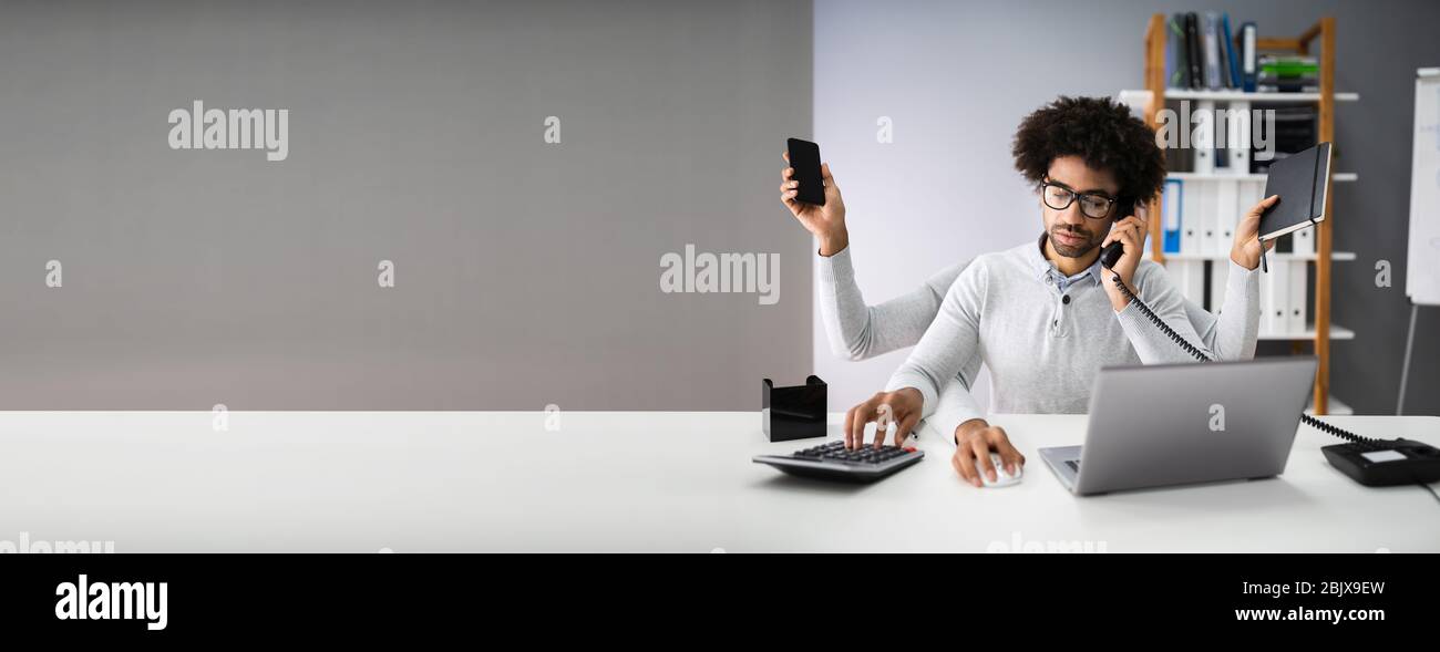 Multitasking Workload Of Happy Busy Man Worker In Office Stock Photo ...