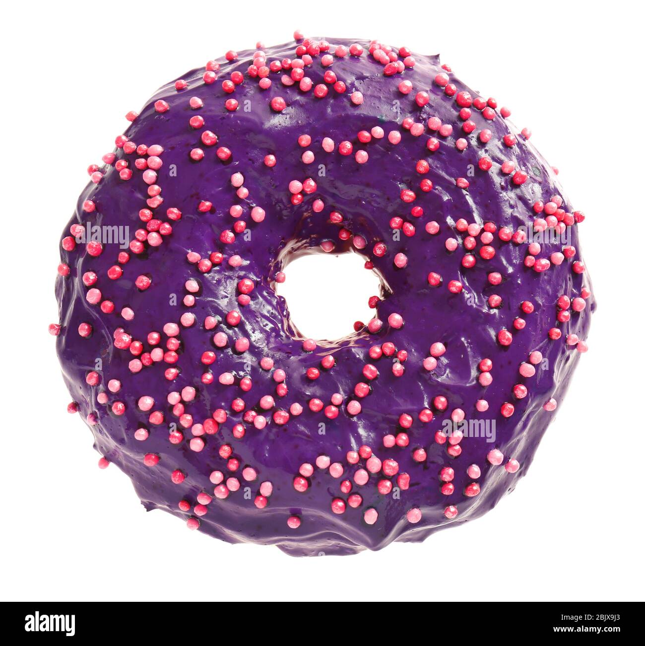 Delicious purple donut on white background Stock Photo - Alamy