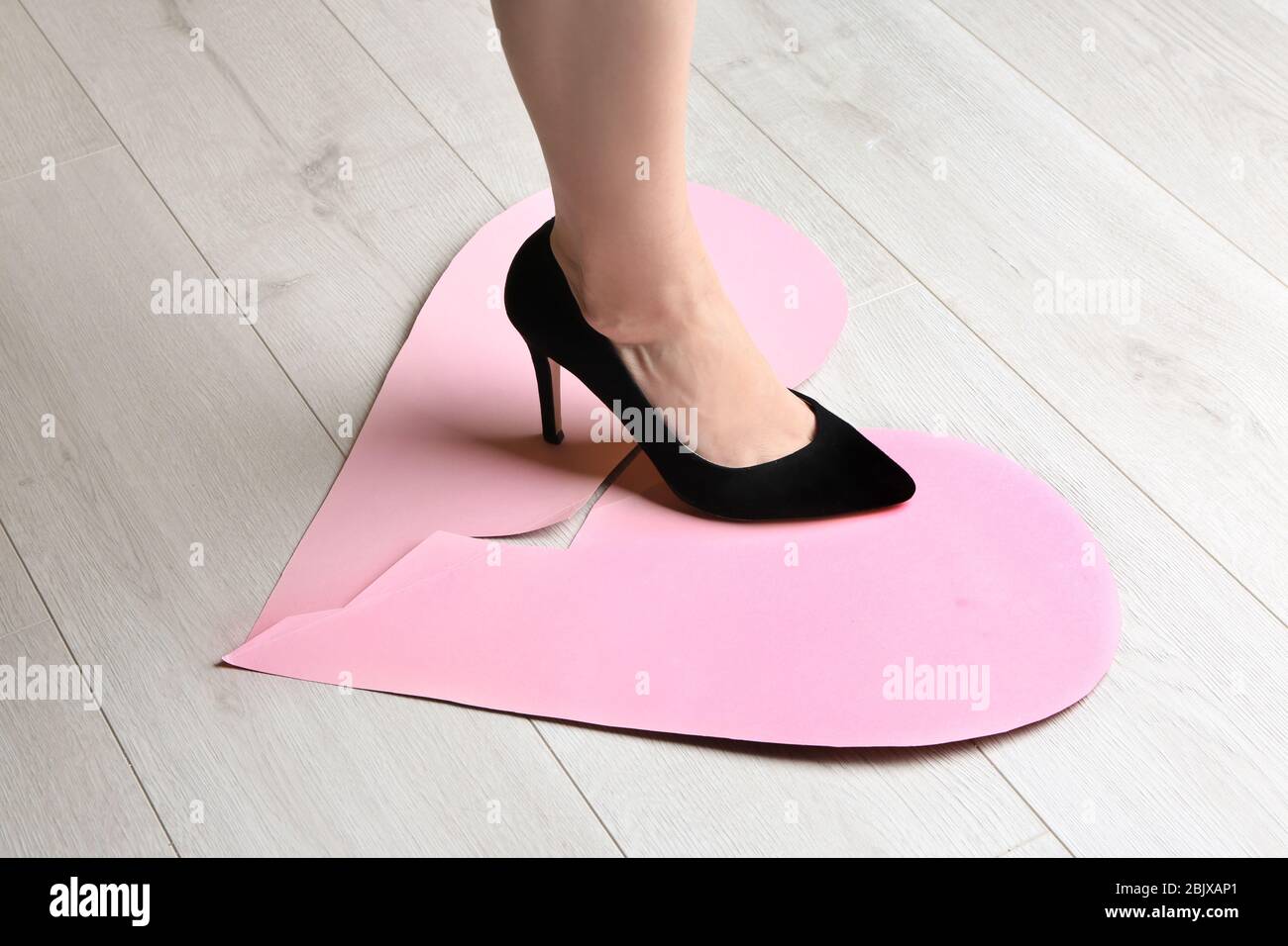 Stepping on heart hi-res stock photography and images - Alamy