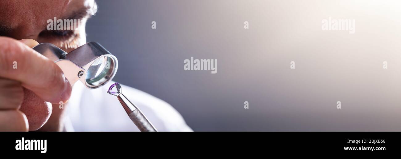 Jeweler Inspecting And Checking Diamond With Magnifying Glass Stock ...