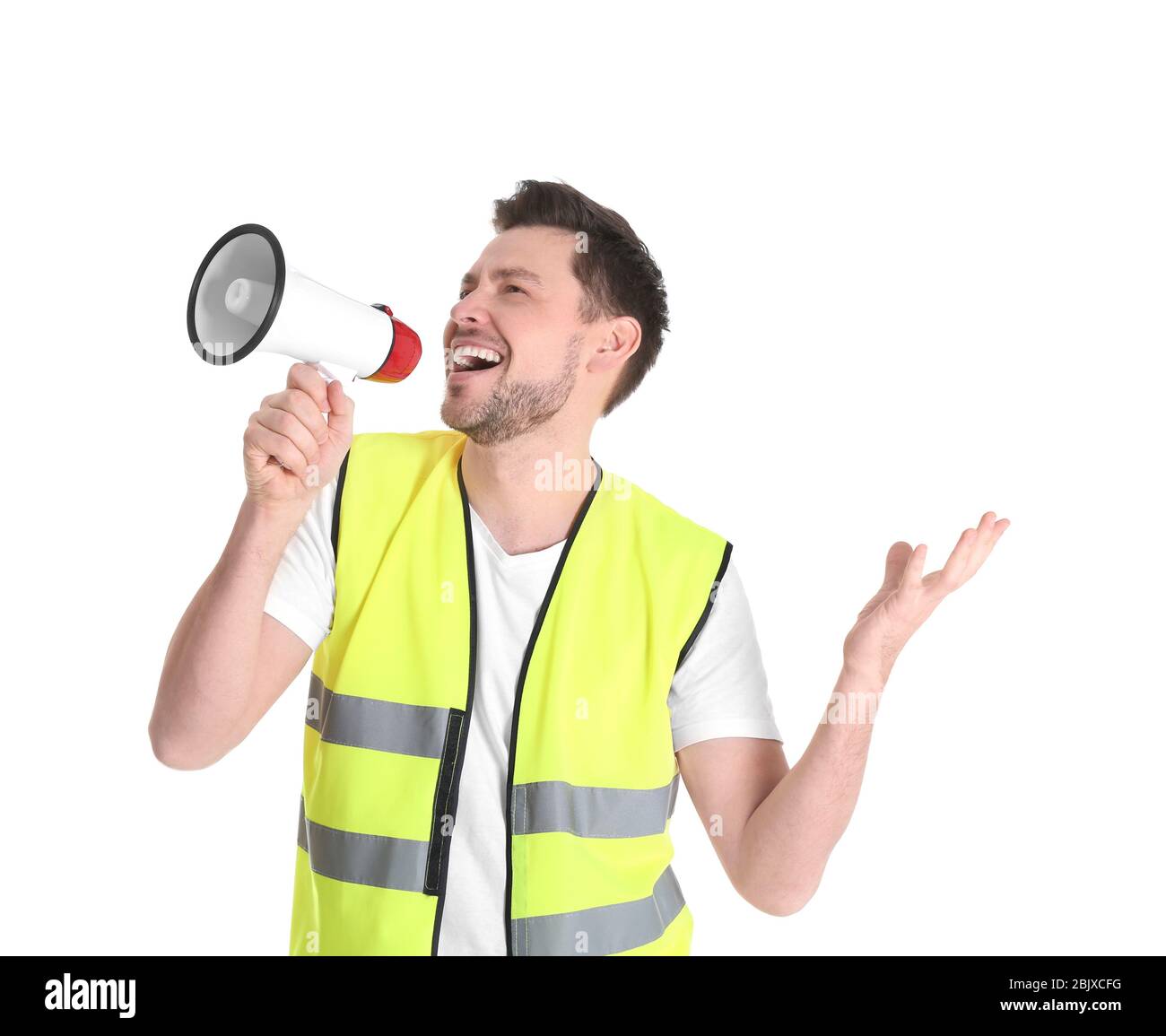 Worker with megaphone on white background Stock Photo - Alamy