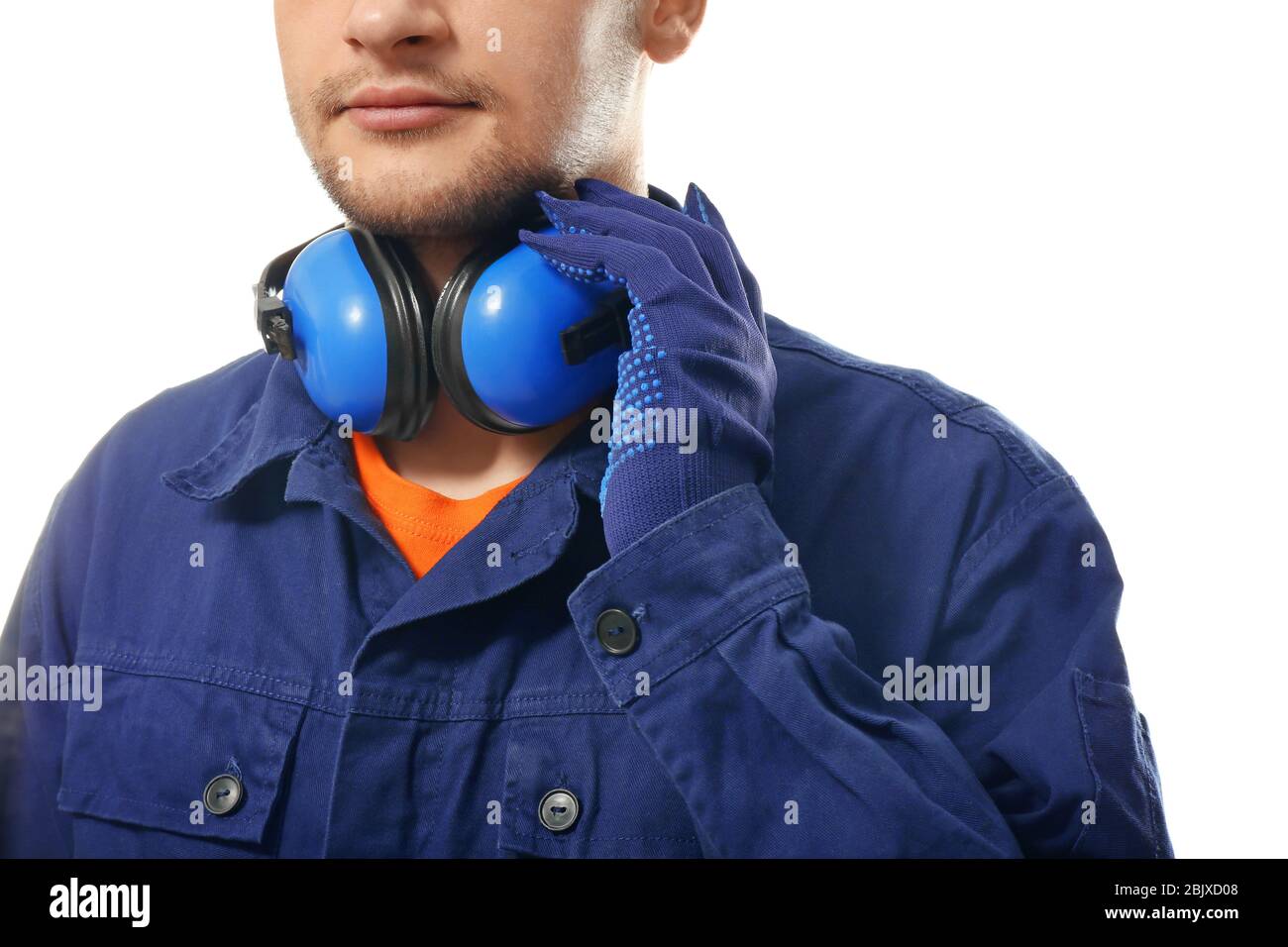 Male worker with headphones on white background. Hearing protection ...