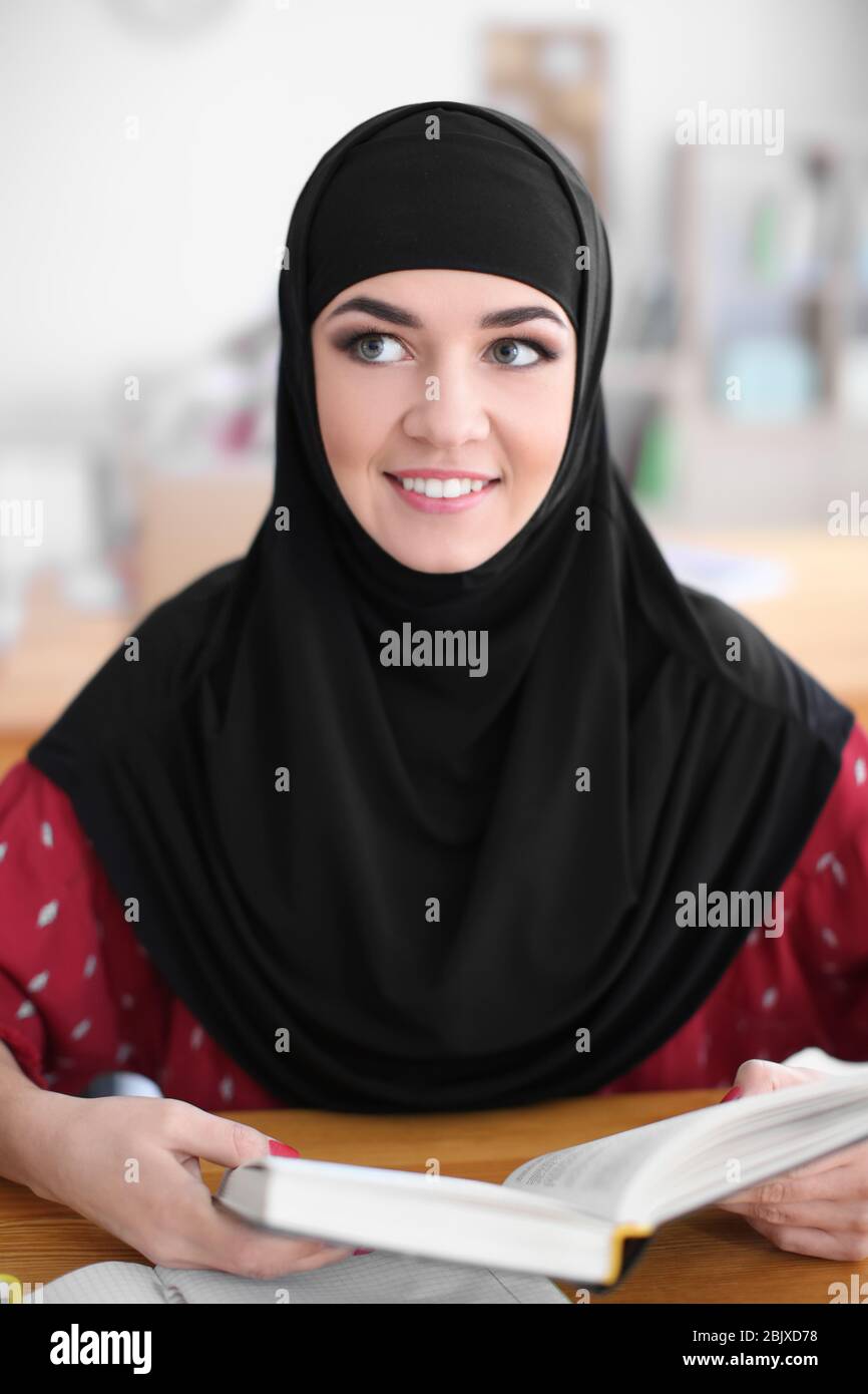 Muslim student wearing traditional clothes in classroom Stock Photo - Alamy