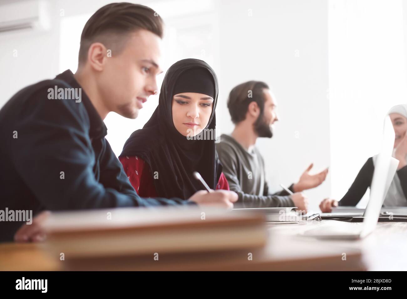 Muslim students laptop hi-res stock photography and images - Alamy