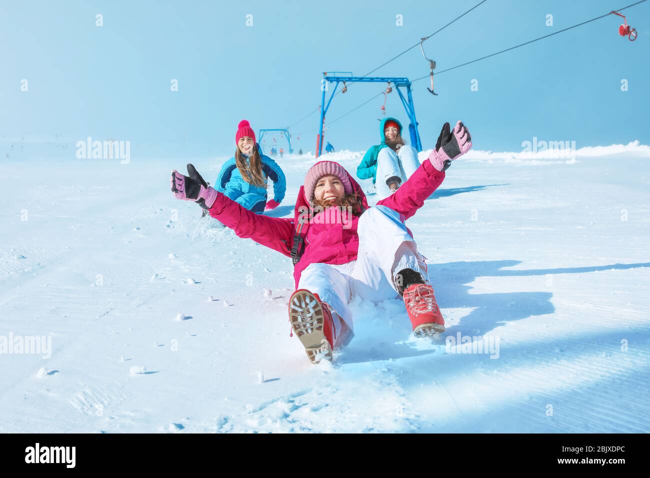 Woman sliding down slope hi-res stock photography and images - Alamy