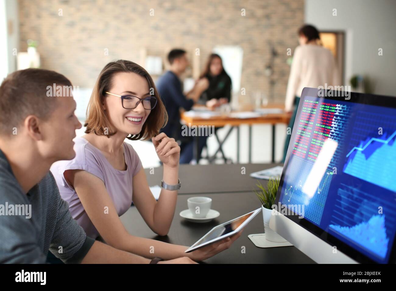 Office employees at business meeting. Forex concept Stock Photo - Alamy