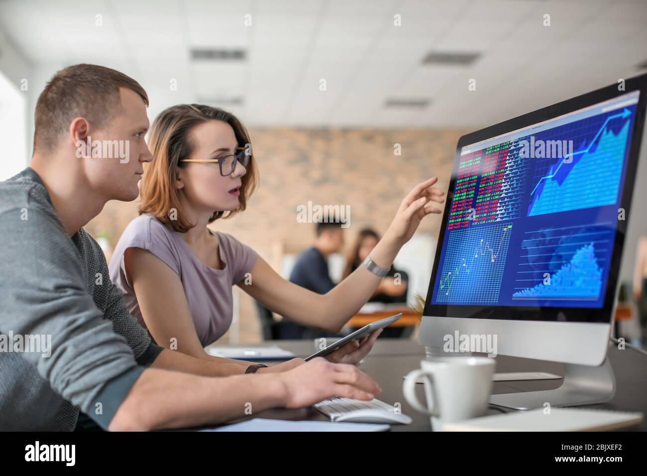 Office employees at business meeting. Forex concept Stock Photo - Alamy