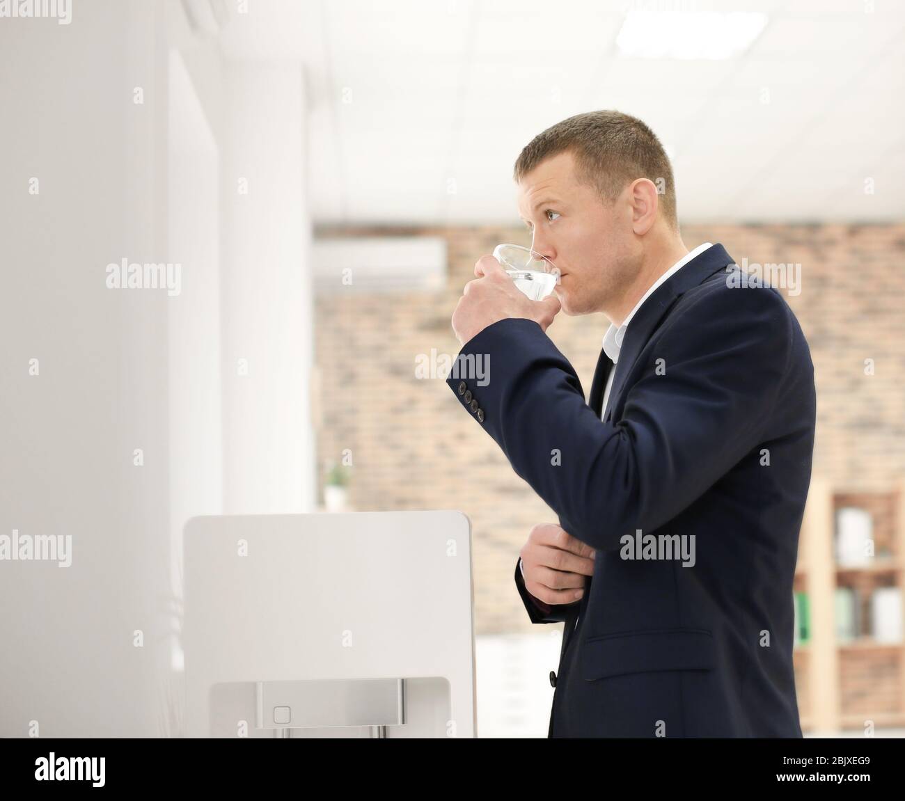 Employee drinking water hi-res stock photography and images - Alamy