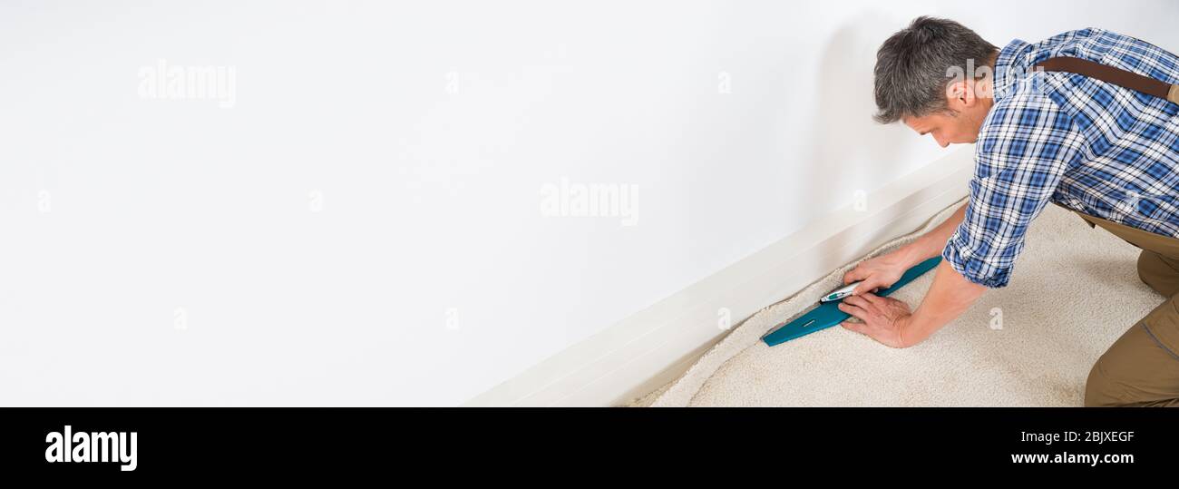 Carpet fitting hi-res stock photography and images - Alamy