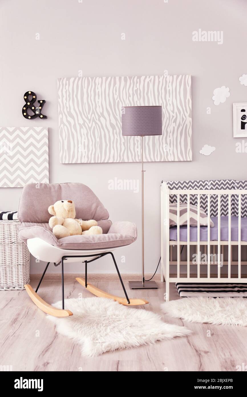 Baby room interior with crib. House design Stock Photo - Alamy