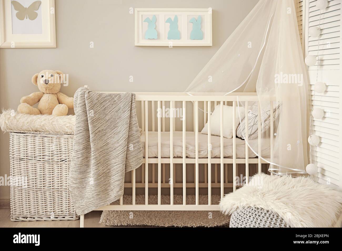 Baby room interior with crib. House design Stock Photo - Alamy