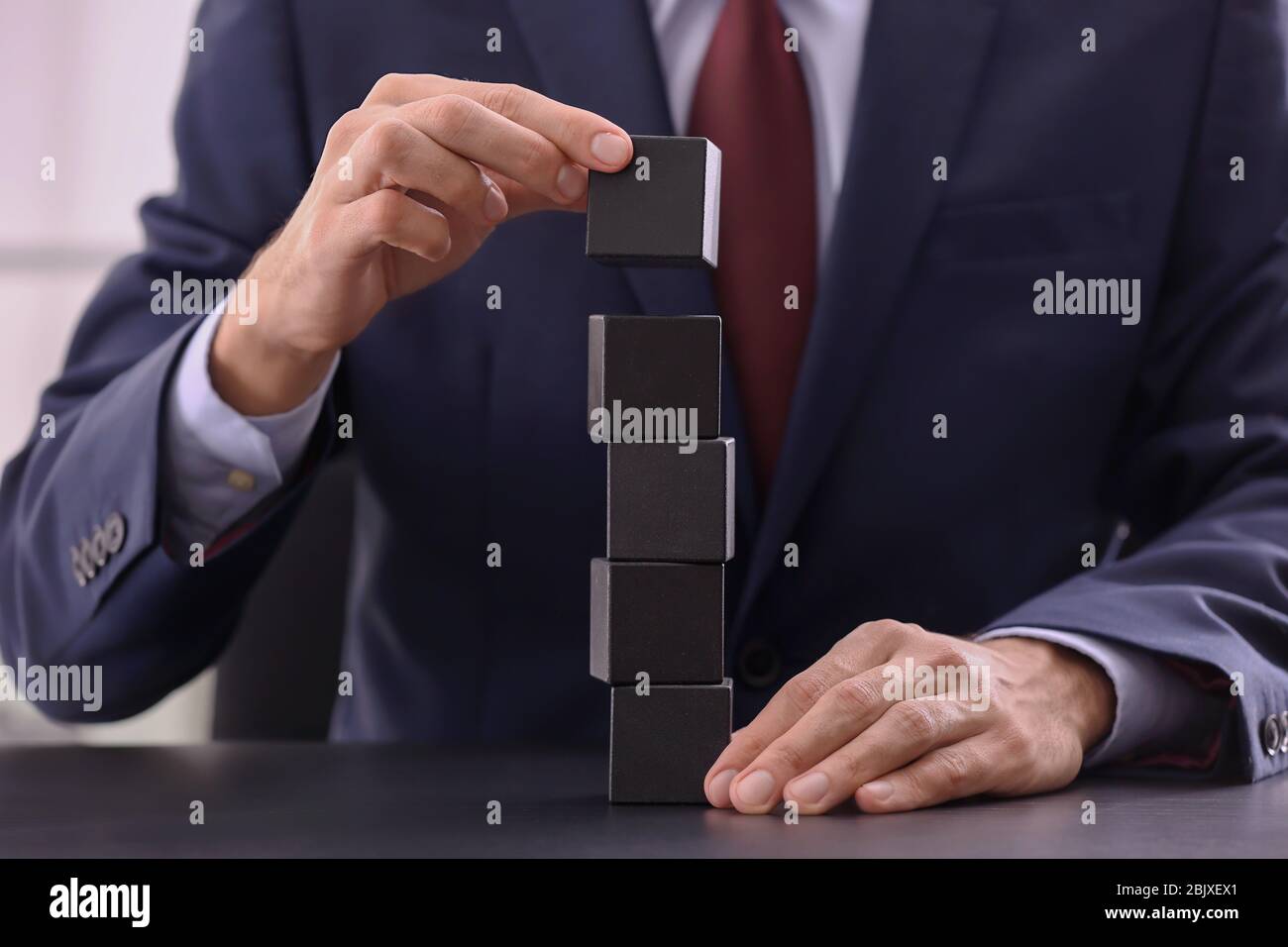 Hands growth building blocks hi-res stock photography and images - Alamy