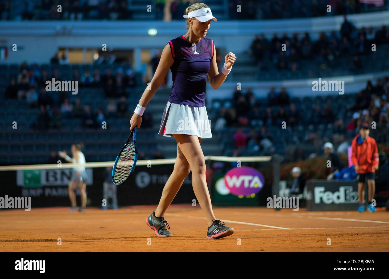 Kristina Mladenovic of France in action during her quarter-final match ...