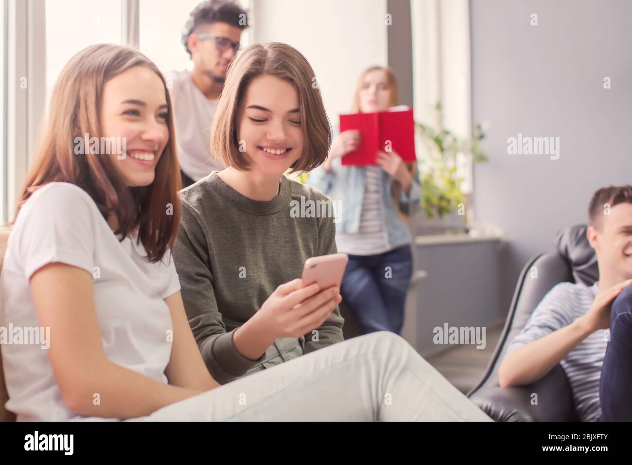 Teens talking in class hi-res stock photography and images - Alamy