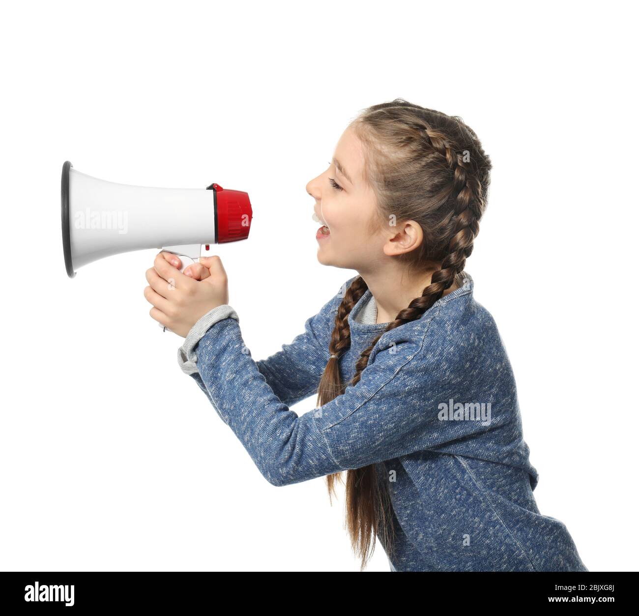 Little girl shouting into megaphone on white background Stock Photo - Alamy
