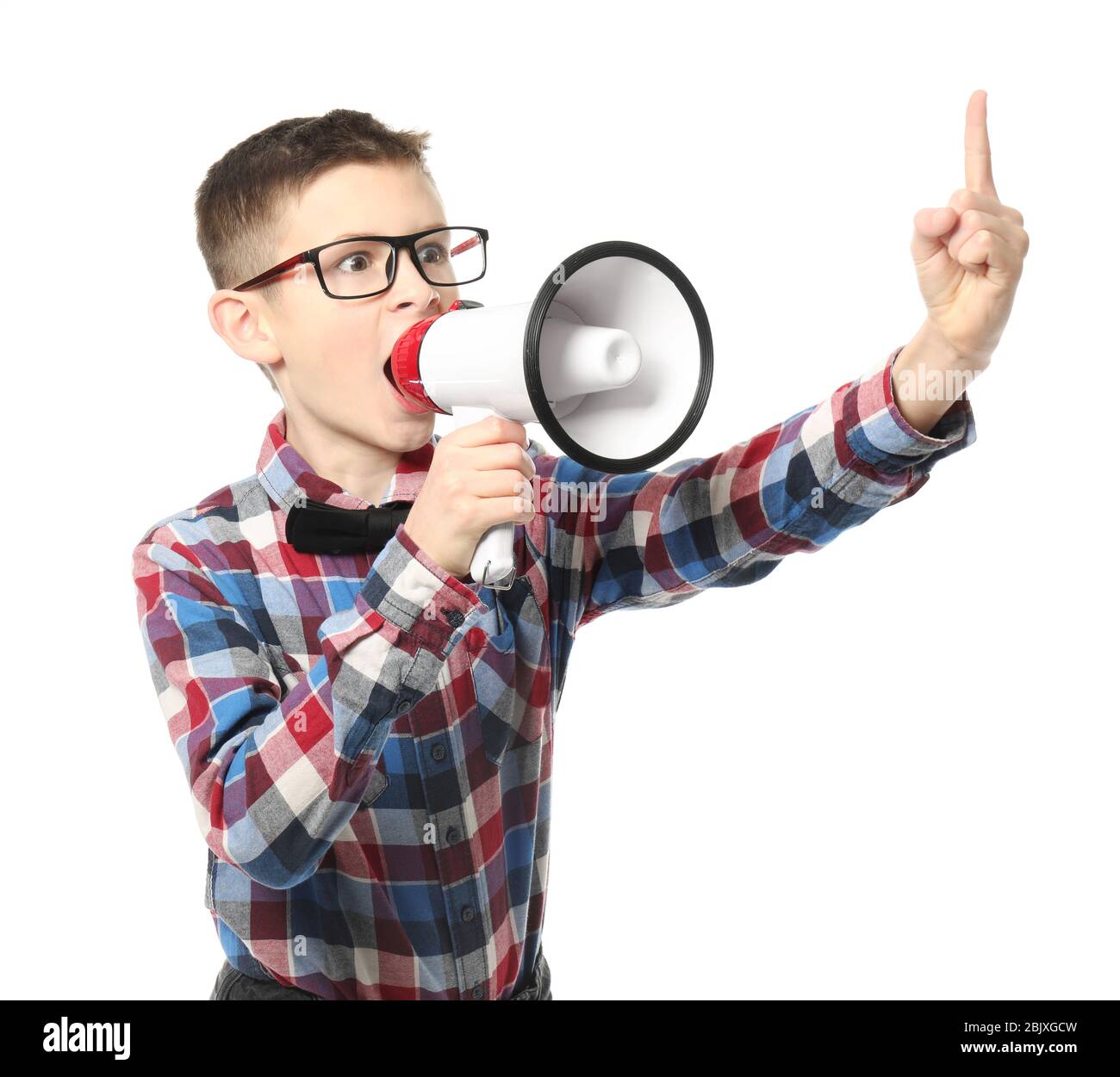 Emotional little boy shouting into megaphone on white background Stock ...