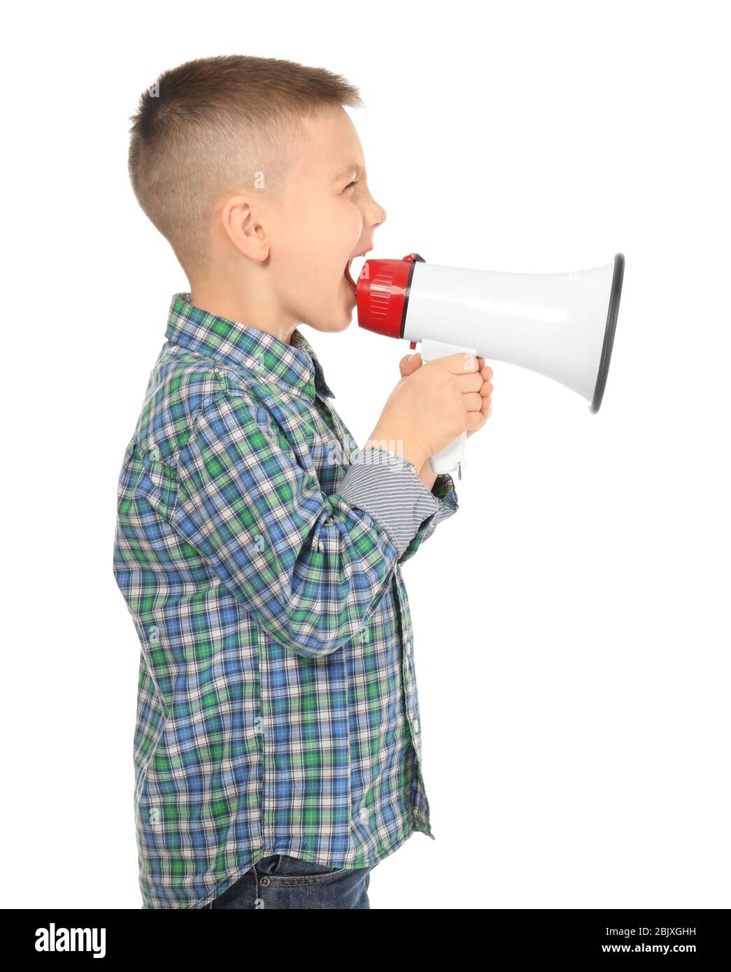 Cute little boy shouting into megaphone on white background Stock Photo ...