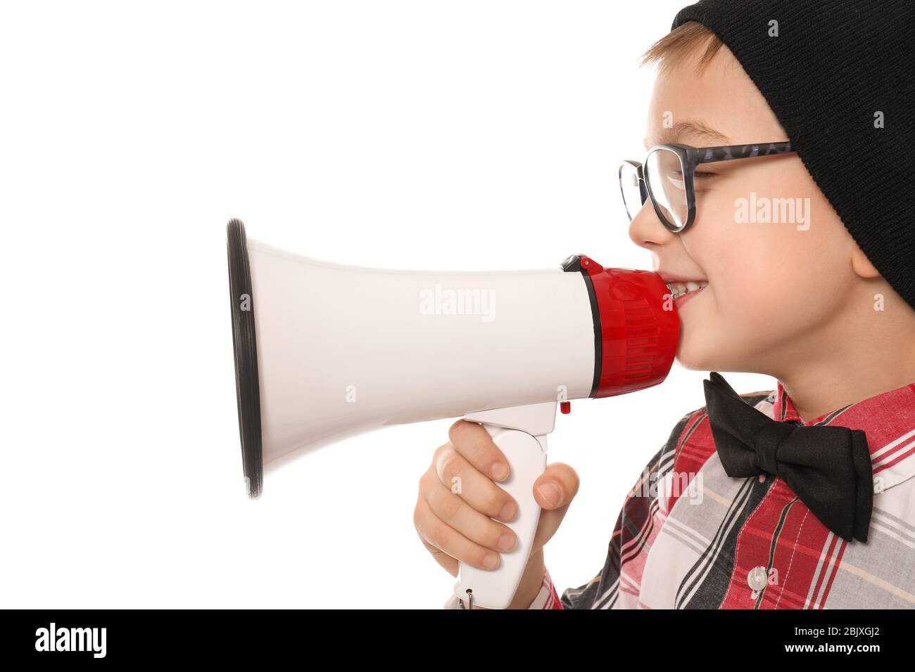 Cute little boy with megaphone on white background Stock Photo - Alamy