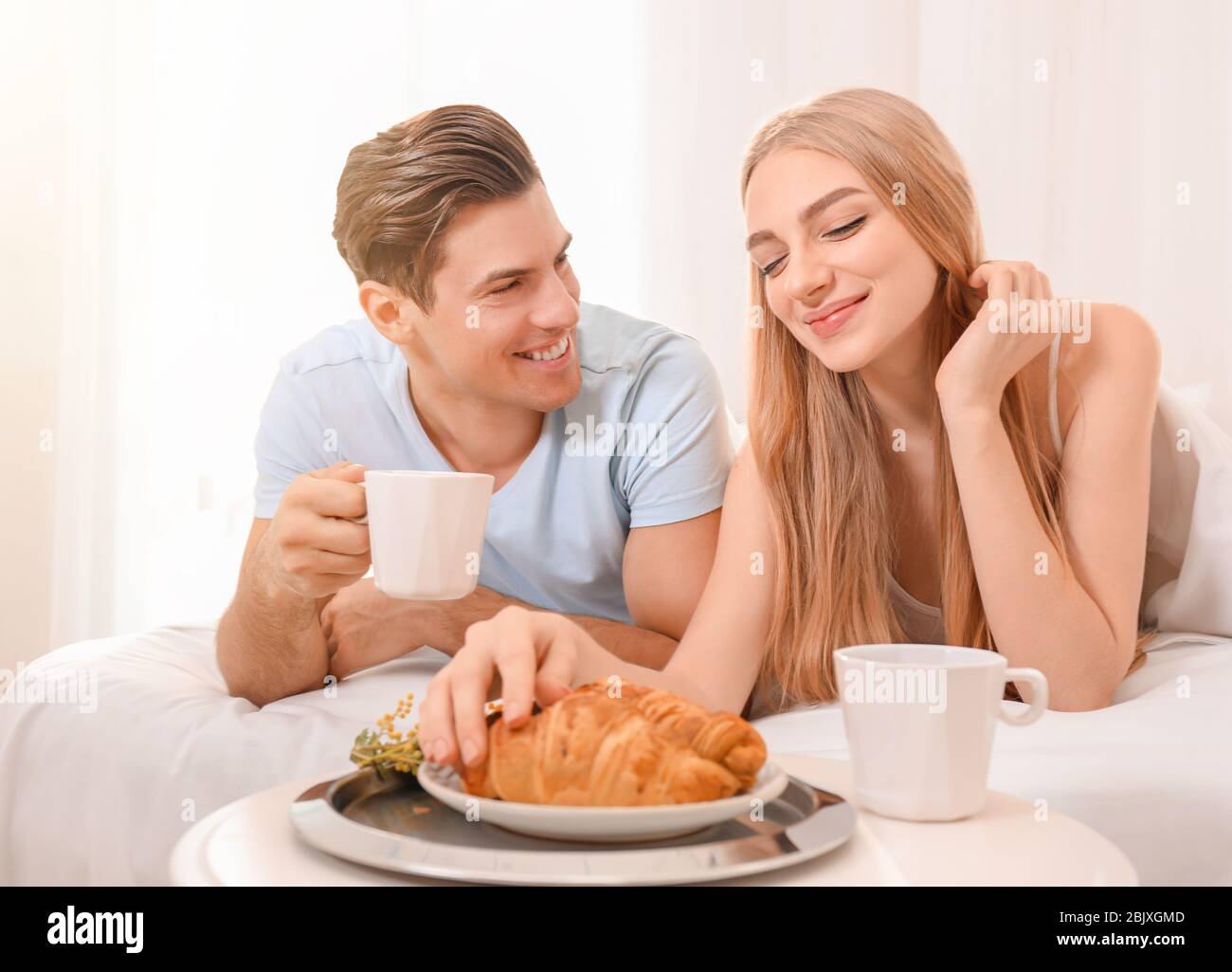 Pajamas table breakfast croissant hi-res stock photography and images ...