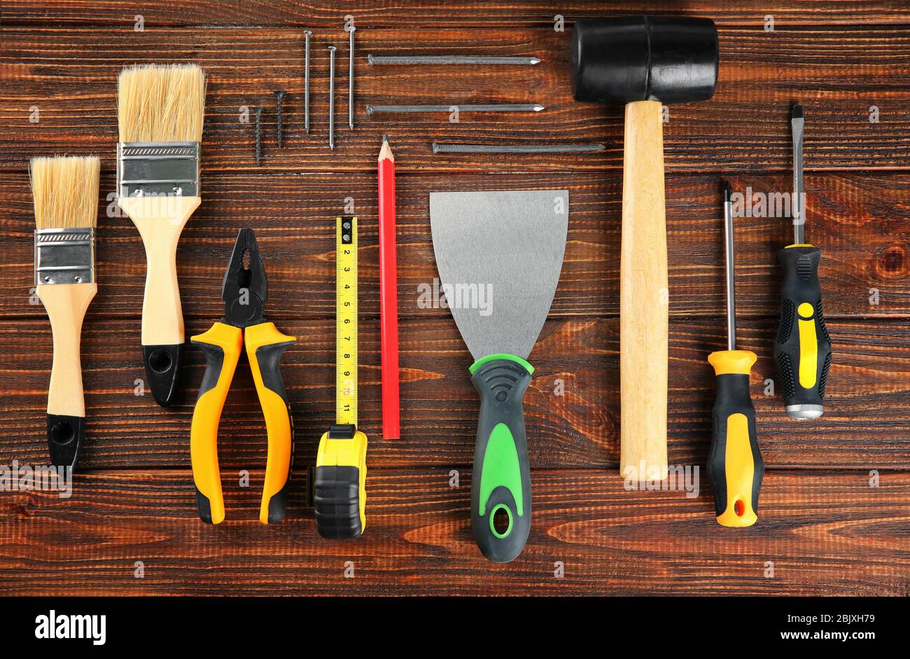 Set of tools on wooden background Stock Photo - Alamy