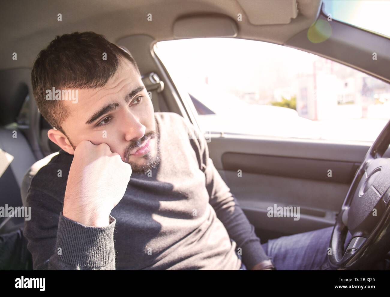 Man driving car bored traffic hi-res stock photography and images - Alamy