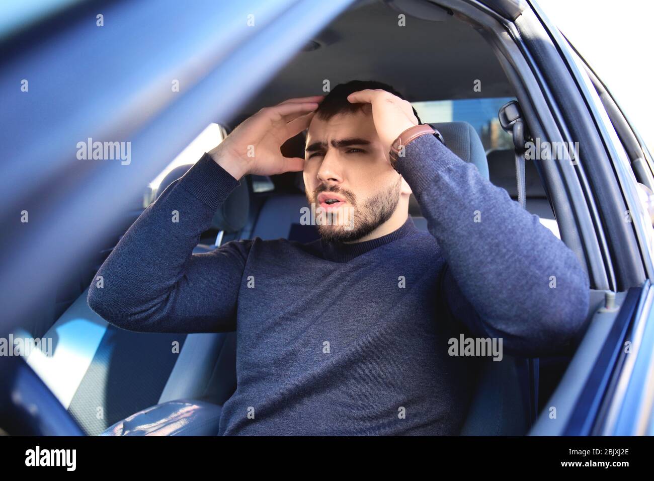 Scared man in car hi-res stock photography and images - Alamy