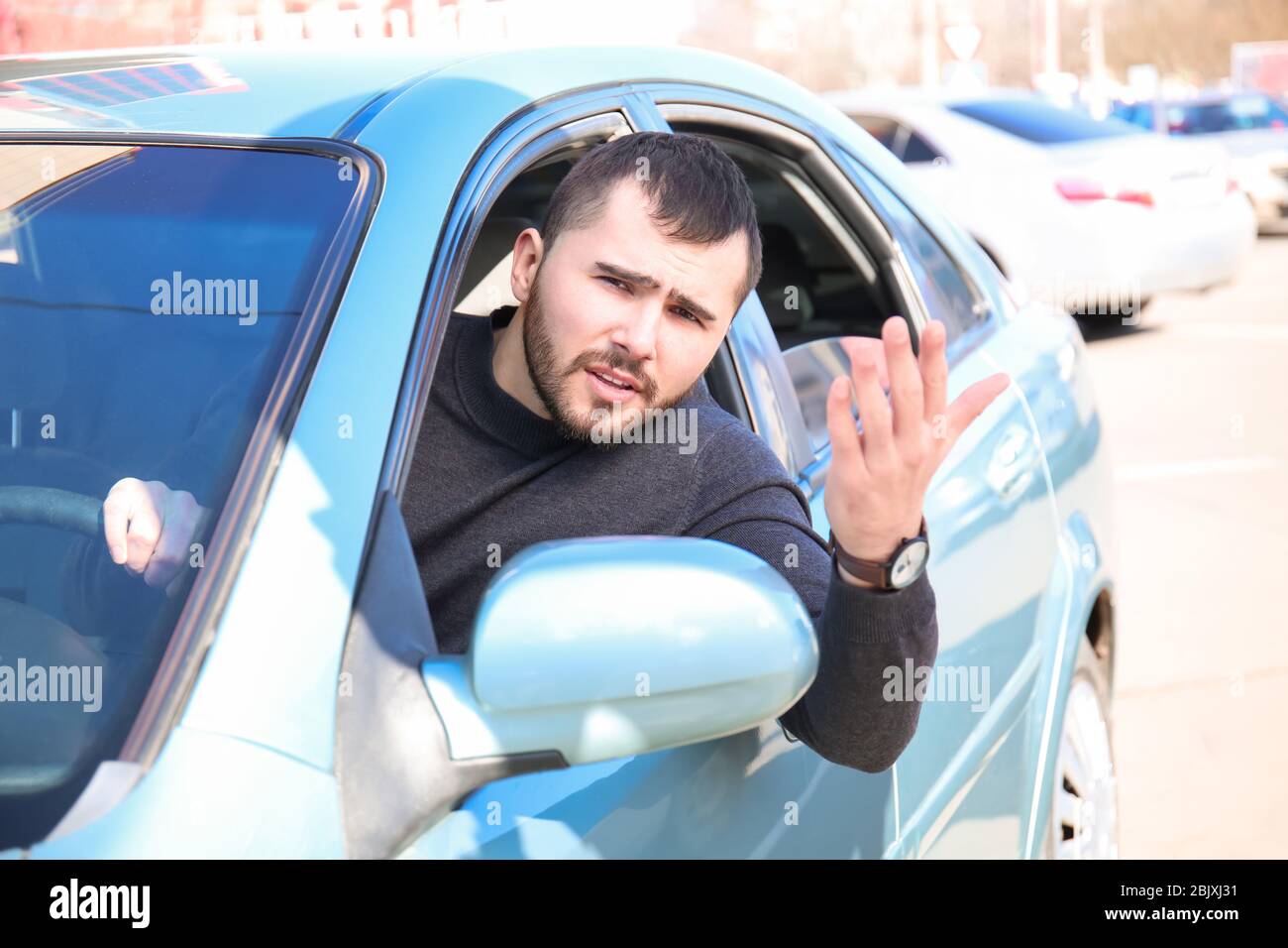 An irritated young man driving hi-res stock photography and images - Alamy