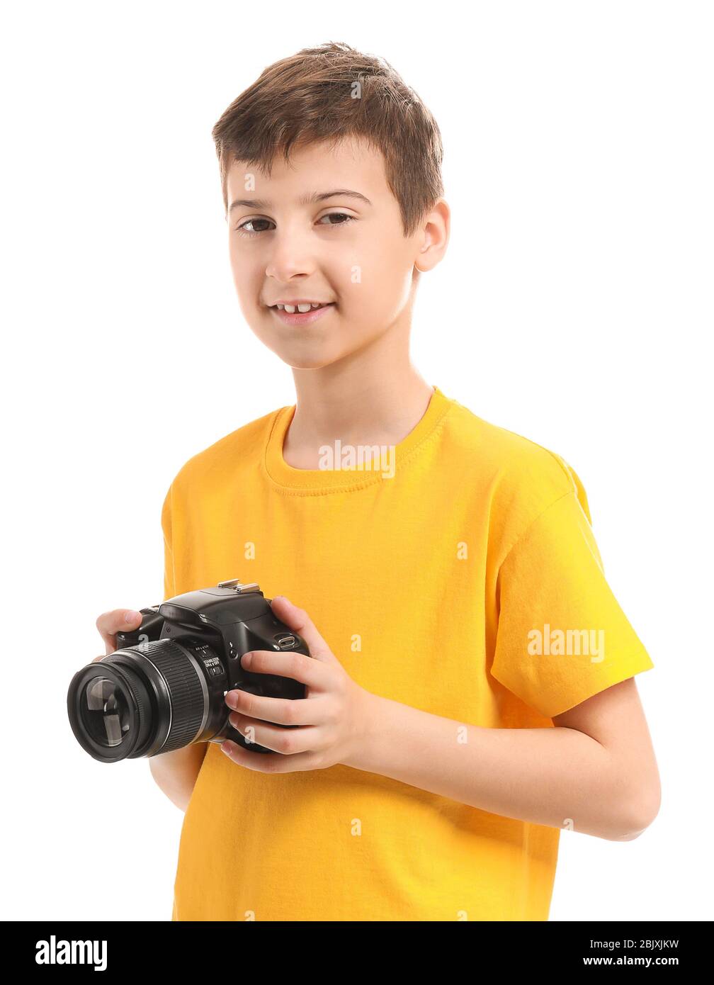 Cute little photographer on white background Stock Photo - Alamy