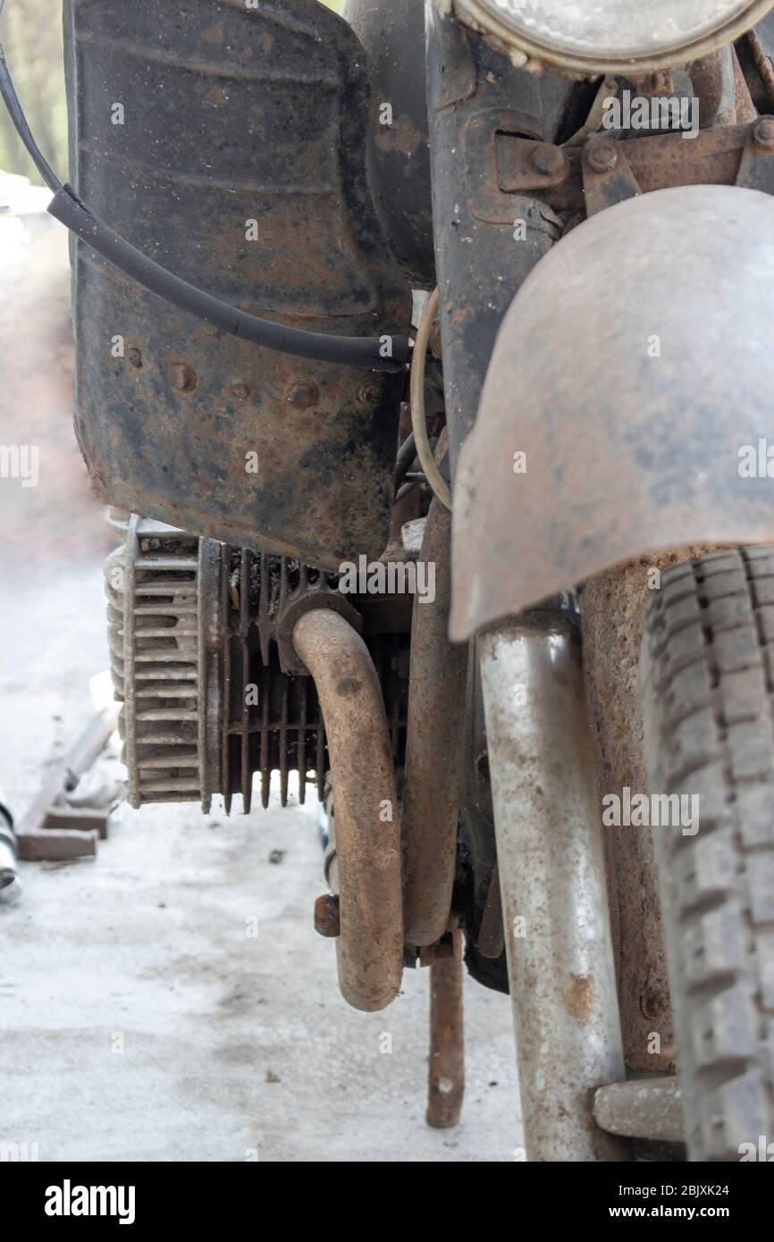 Front wheel and engine of an old retro bike with an opposing engine ...