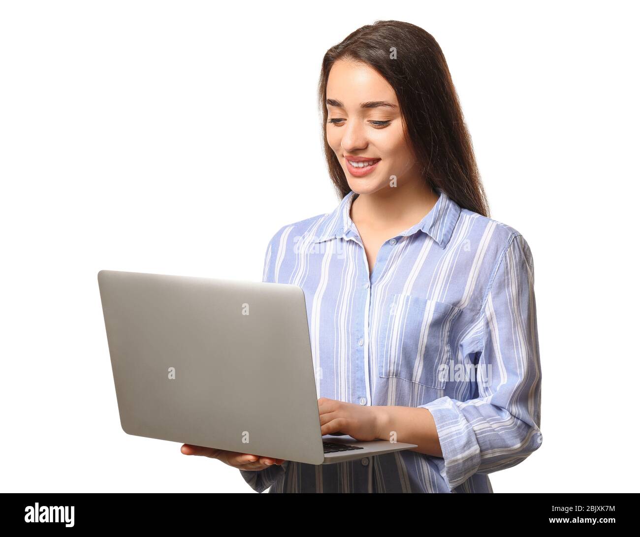 Young female programmer with laptop on white background Stock Photo - Alamy