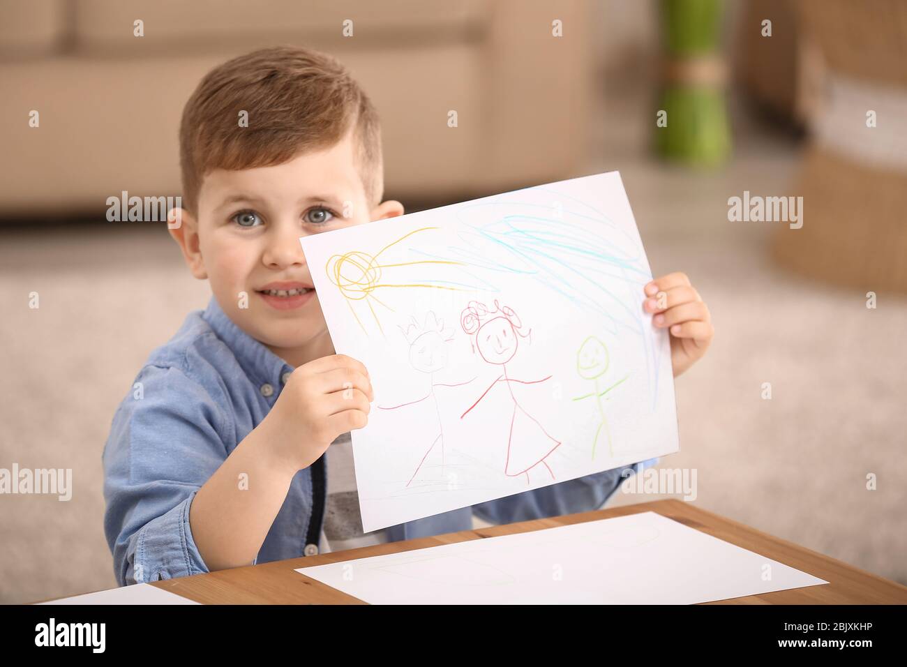 Cute little boy drawing at home Stock Photo - Alamy