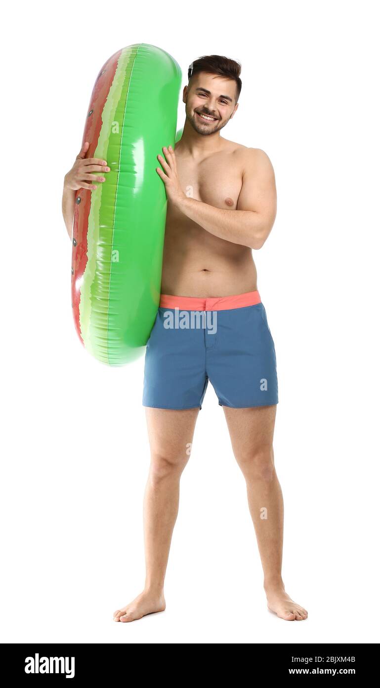 Happy young man with inflatable ring on white background Stock Photo ...