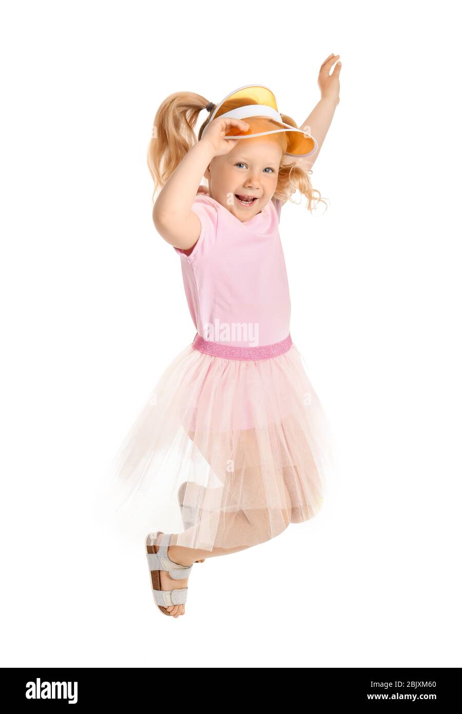Portrait of jumping little girl on white background Stock Photo - Alamy
