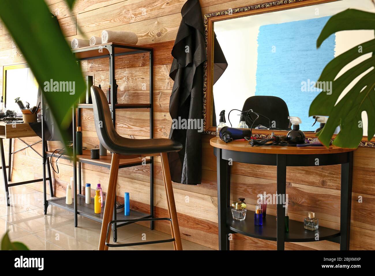 Interior of modern hairdressing salon Stock Photo - Alamy