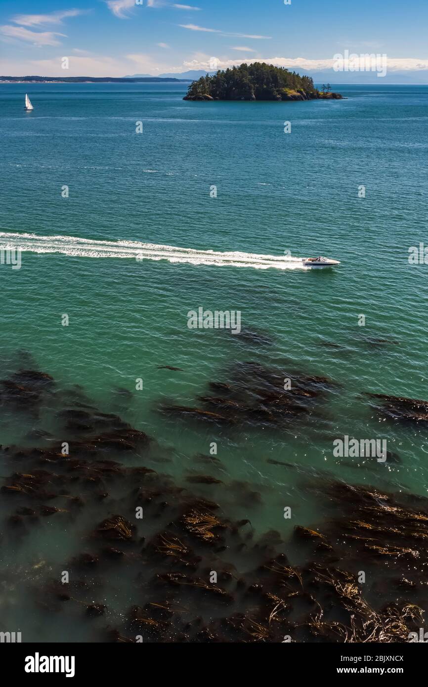 Boats and Deception Island off Rosario Head in Deception Pass State ...