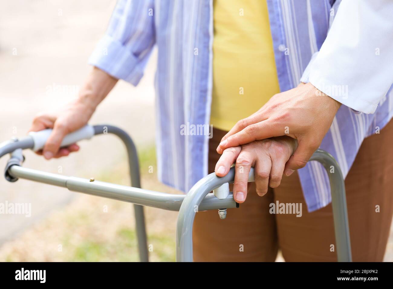 Looking after disabled people at home hi-res stock photography and ...