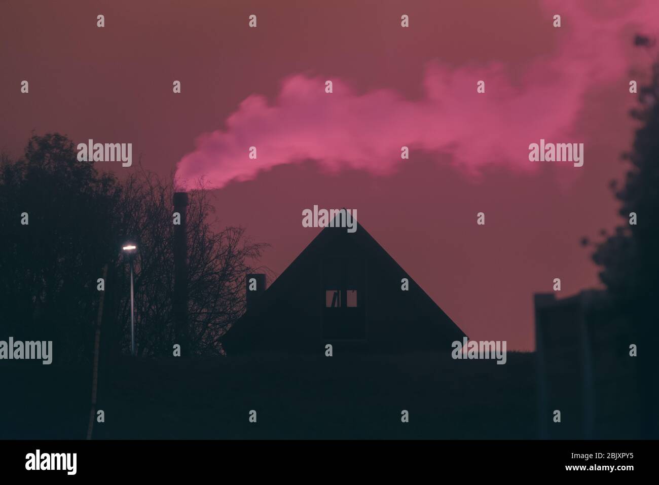 Illumination at night. Pink Smoke in the sky. Scene Stock Photo - Alamy
