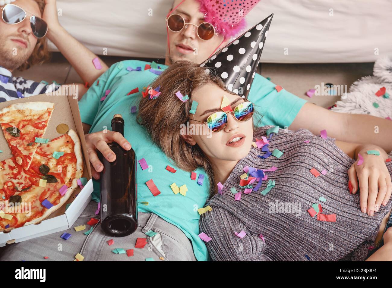 Unconscious woman party hat hi-res stock photography and images - Alamy