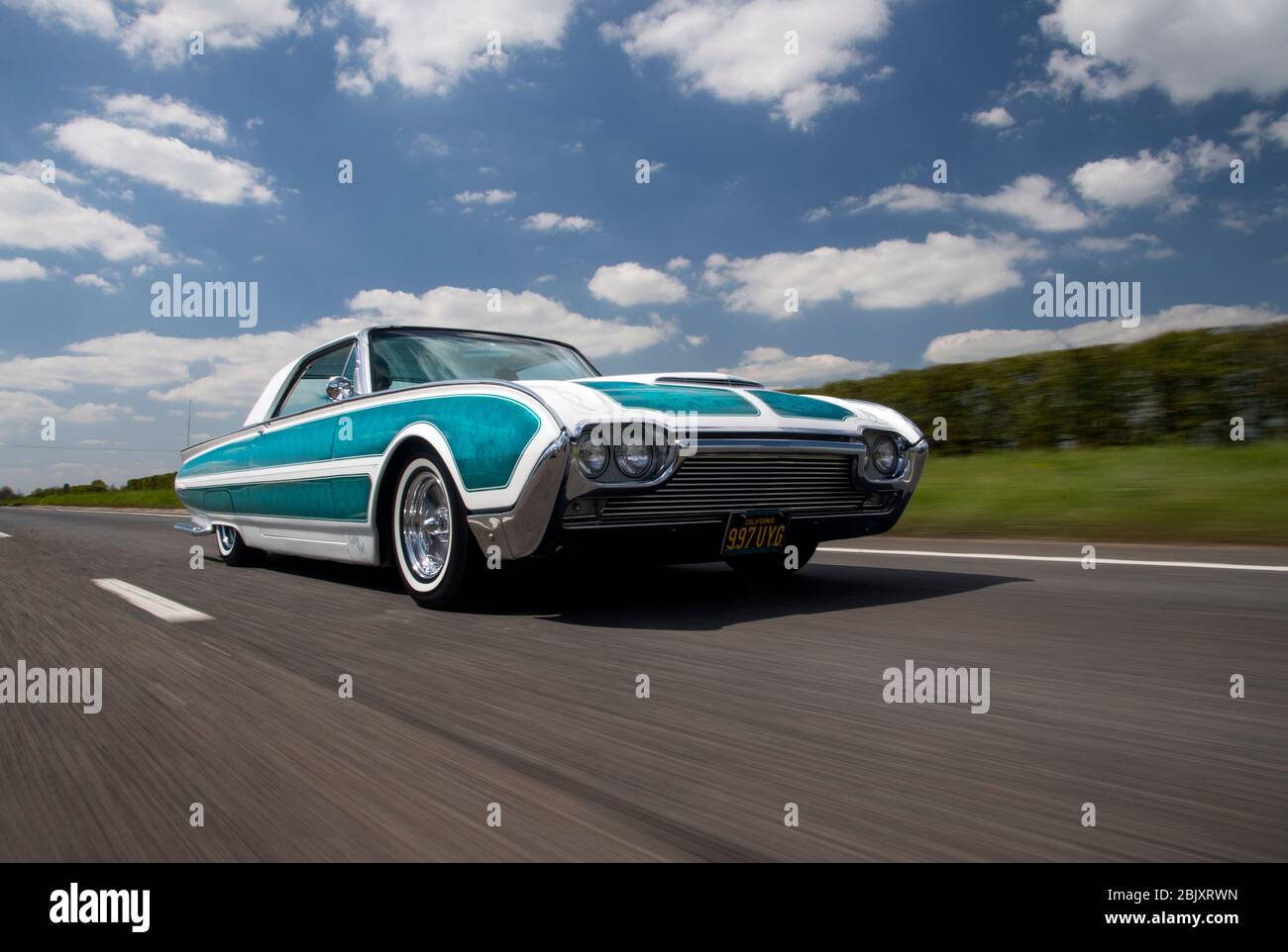 Ford Thunderbird low rider with LA Gang style girl Stock Photo - Alamy