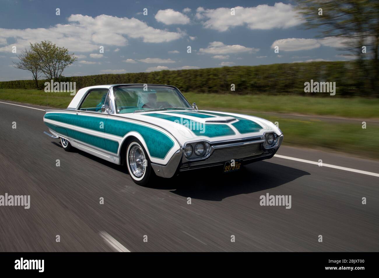 Ford Thunderbird low rider with LA Gang style girl Stock Photo - Alamy