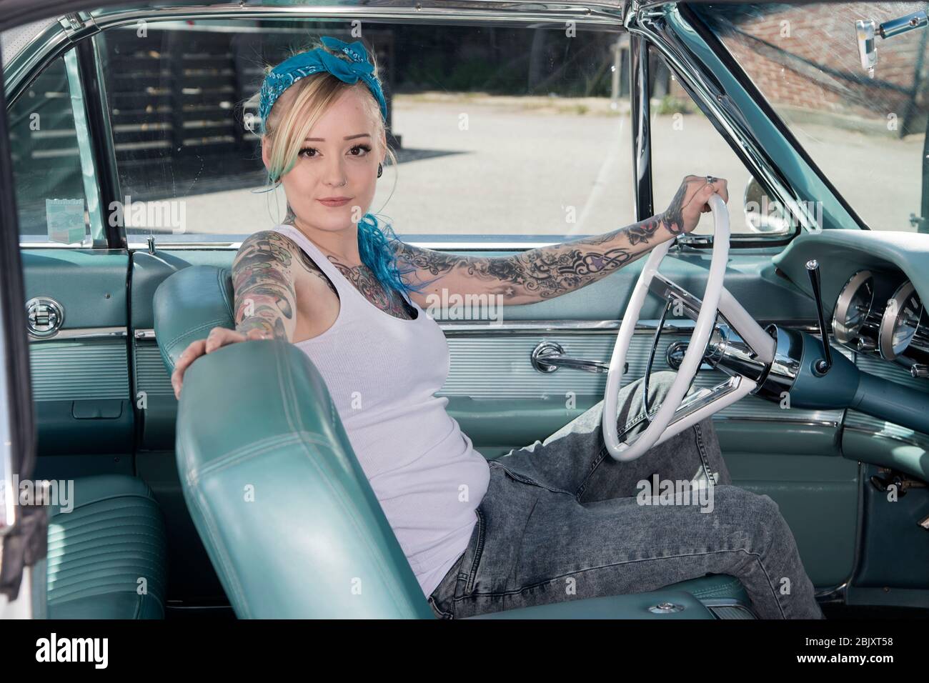 Ford Thunderbird low rider with LA Gang style girl Stock Photo - Alamy